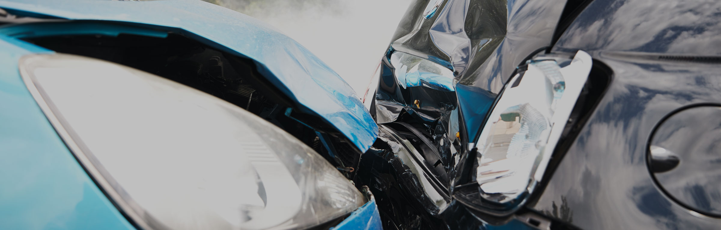 close-up-of-two-cars-damaged - Select Auto Body